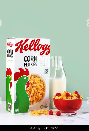 Corn Flakes Kellogg's box with a red bowl of cereal and raspberries and ...