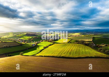 Lights and Shadows over Fields and Farms from a drone, Devon, England ...