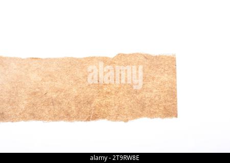 a piece of brown blank torn note paper Stock Photo - Alamy