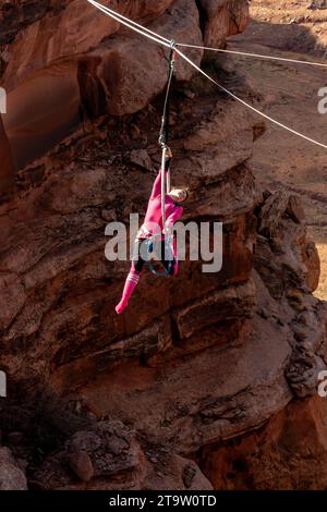 Aerial acrobat in the ring. A young girl performs the acrobatic ...