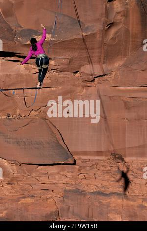A woman on the highline with her shadow over Mineral Canyon at the GGBY ...