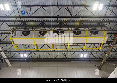 A five-fan industrial refrigeration evaporator fan at an ammonia-cycle ...