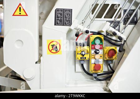 Buttons and levers of the control panel of the white garbage truck ...