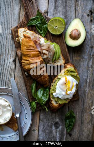 Croissant sandwiches with jamon ham serrano paleta iberica, avocado ...