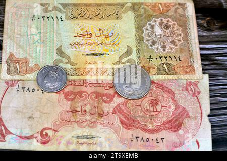 Qatari Money, money background of old coins and banknotes of riyals of ...