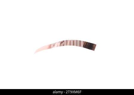 Piece of bronze confetti isolated on white Stock Photo - Alamy