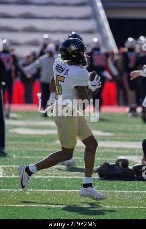 Colorado wide receiver Jimmy Horn Jr., right, is pushed out of bounds ...