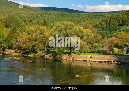 The River Una as it passes through Kulen Vakuf village in Una National ...