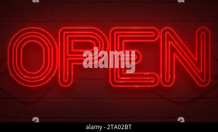 flickering blinking red neon sign on black background, closed ...