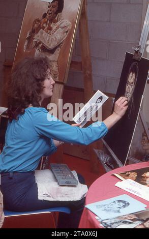 Nancy Wolf, a painter who specialized in paintings of Elvis Presley. At ...