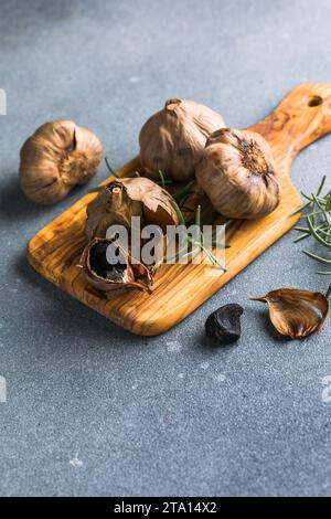 Black garlic, health food made by fermenting garlic Stock Photo - Alamy