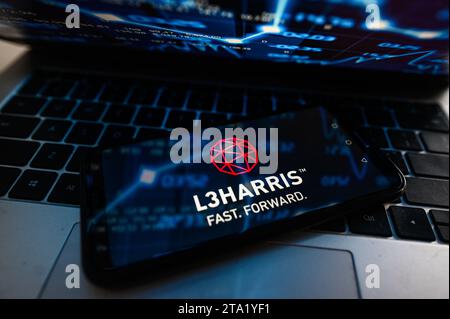 In this photo illustration, the L3 Harris logo seen displayed on a ...