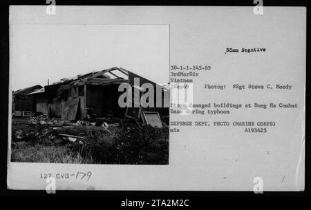 "Storm damage at Dong Ha Combat Base shows damaged buildings during ...