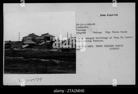 Buildings at Dong Ha Combat Base in Vietnam show storm damage from a ...
