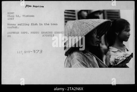 A Vietnamese civilian market during the Vietnam War. Lieutenant ...