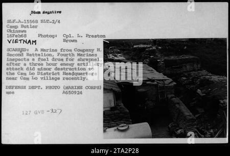 US Marines and Vietnamese buildings and bunkers at the Frank Reasoner ...