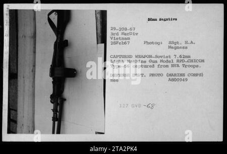 "Marine Corps personnel inspect a captured Soviet 7.62mm Light Machine ...