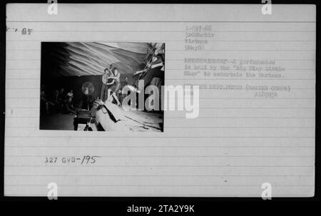 Entertainers perform the "Big Tiny Little Show" for Marines stationed in Vietnam on May 9, 1966 ...