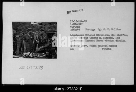 Lieutenant Colonel Nickelson and Mr. Chaffee converse with Marine Lance ...