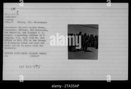 Lieutenant Colonel Walter Moore and Captain J. L. Cooper conversing ...