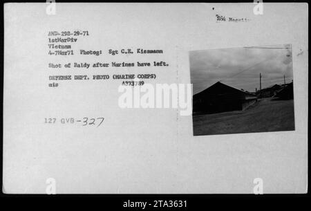 US Marines and Vietnamese buildings and bunkers at the Frank Reasoner ...