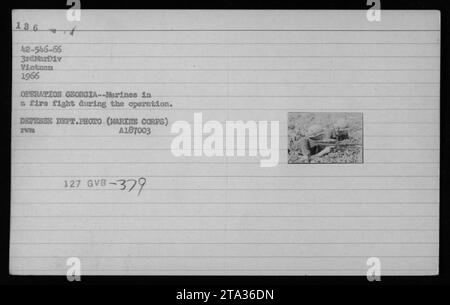 A photograph of a 106-mm recoilless rifle crew from the Third Marine ...