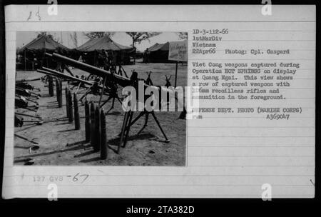 Captured Viet Cong weapons, including rifles and other small arms, laid ...