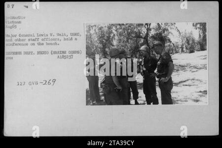 Major General Lewis W. Walt and staff officers hold a briefing ...