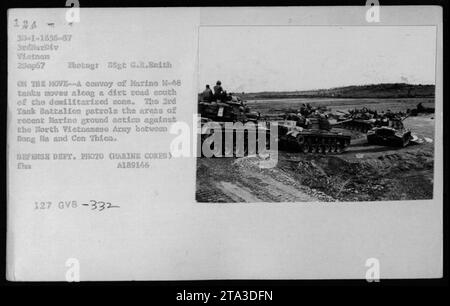 A tank of the 3rd Tank Battalion moves along a makeshift road in ...