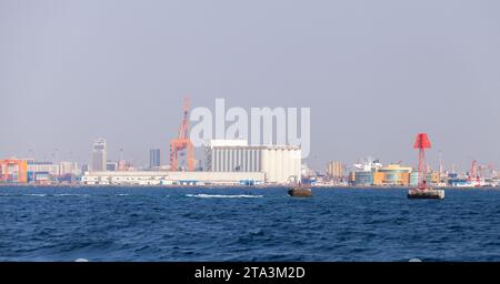 Jeddah Islamic Seaport seaside view with white traffic control tower ...