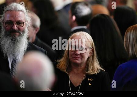Amy Carter and her husband John Joseph "Jay" Kelly watch after a ...
