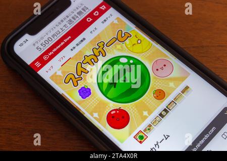 Suika Game (also known as Watermelon Game), a Japanese puzzle video ...