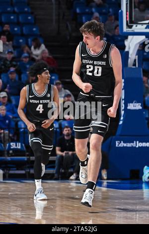Utah State center Isaac Johnson (20) and forward Karson Templin (22 ...