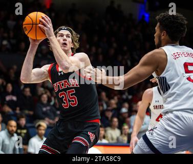 Utah center Branden Carlson (35) celebrates with fans following their ...
