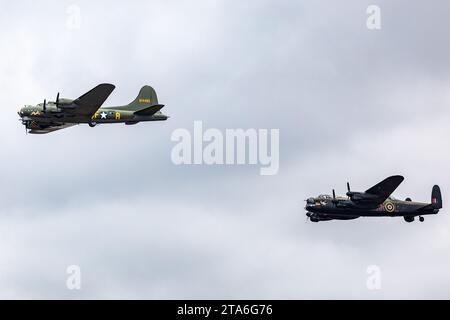 Lancaster and B-17 WW2 bomber flying together Stock Photo - Alamy