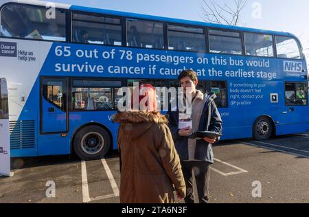 EDITORIAL USE ONLY The 'NHS Bus-ting Cancer' bus passes through ...