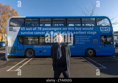 EDITORIAL USE ONLY The 'NHS Bus-ting Cancer' bus passes through ...