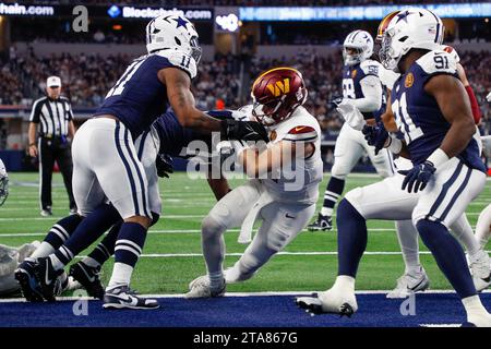 Dallas Cowboys quarterback Sam Howell throws during NFL football ...
