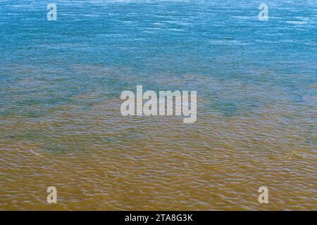 Confluence of the blue Ohio river and brown Mississippi river at Cairo ...