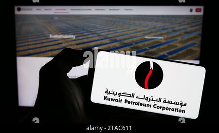 Cellphone with logo of Kuwaiti oil company Kuwait Petroleum Corporation ...
