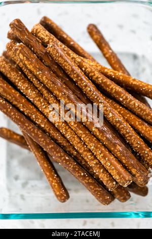 Chocolate-covered pretzel rods Stock Photo - Alamy