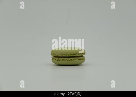 Green color macaron with pillow in front of a white background Stock ...