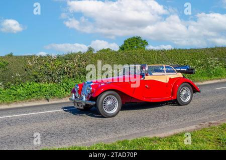 Red MG sports car driven by Elvis Presley in the film Blue Hawaii, now ...
