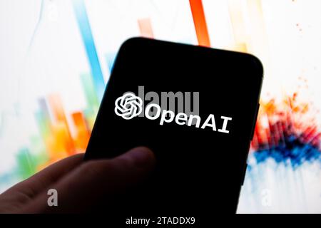 In this photo illustration an OpenAI Chat GPT logo logo seen displayed ...
