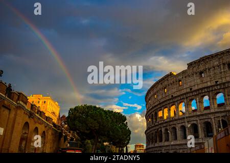 The colosseum with rainbow by its left side, Rome, the capital city of ...