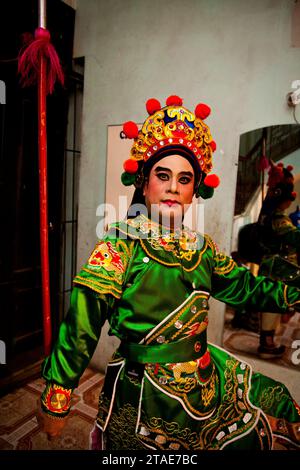 Performers of traditional theatre poses backstage in Hanoi, Vietnam ...