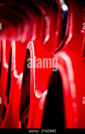Painted Vespa chassis lined up ready for the assembly line at the ...