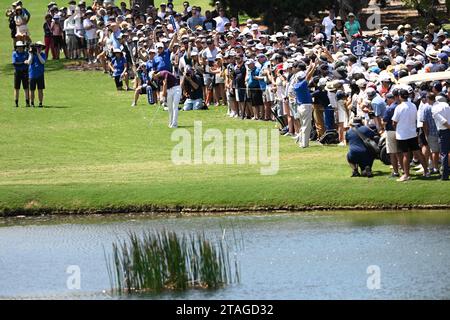 Min Woo Lee of Australia plays a shot in round one of the Australian ...
