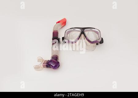Purple plastic diving and snorkeling mask isolated on white background ...