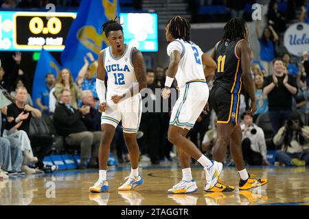UCLA guard Sebastian Mack celebrates after scoring during the second ...